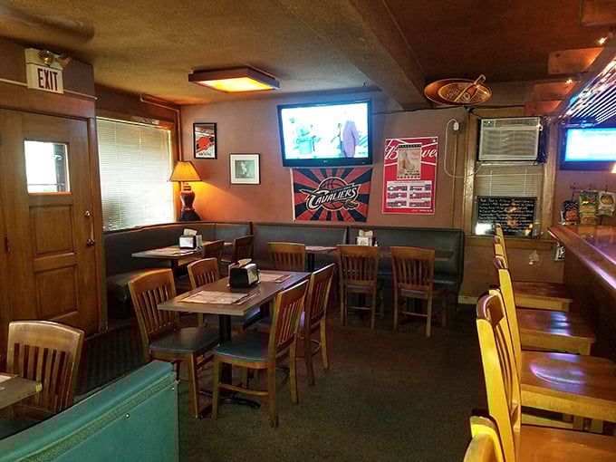 The dining area strikes that perfect balance between "comfortable enough to linger" and "lively enough to feel the energy." Cleveland sports memorabilia watches over diners like protective saints.