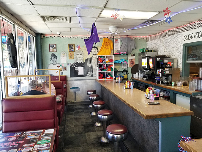 Classic diner aesthetics with character to spare—red booths, counter seating, and walls adorned with decades of memories. This is where breakfast stories begin.