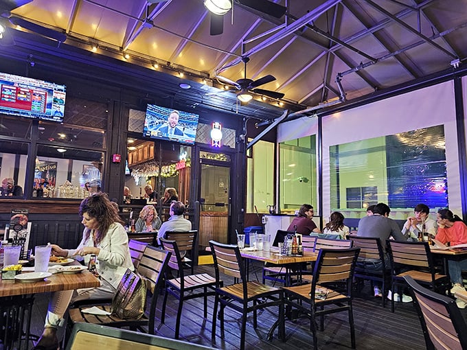 Evening lighting transforms the dining area into something magical. Those purple hues aren't just illumination – they're setting the stage for seafood theater.
