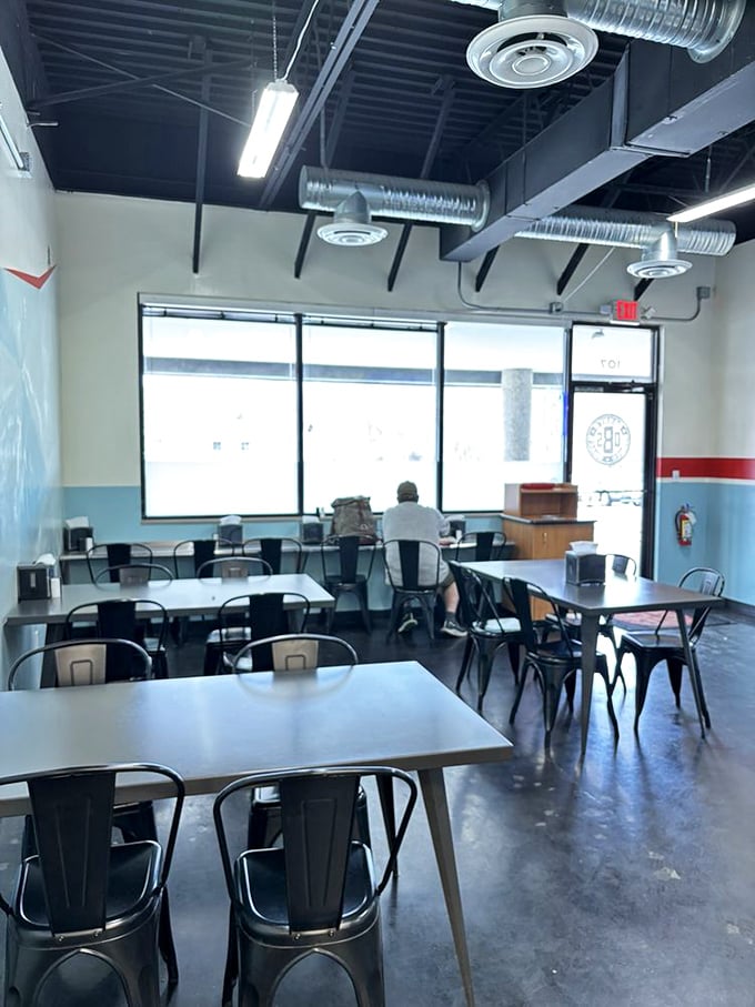 The dining area's industrial-chic simplicity sends a clear message: we're not here for the décor, folks. We're here for food that makes your taste buds do backflips.