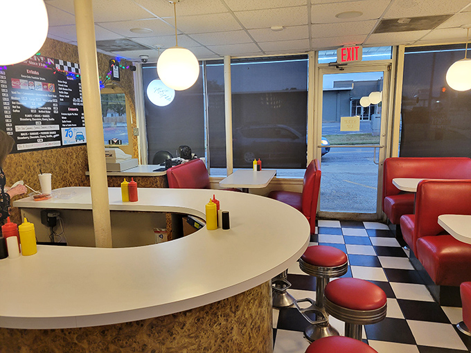 The curved counter and globe lights create a diner atmosphere so authentic, you half expect to see The Fonz walk in and hit the jukebox.