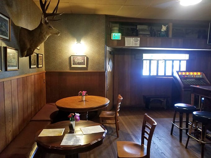The dining area feels like your favorite uncle's cabin—if your uncle happened to be an excellent cook with a mounted deer head collection.