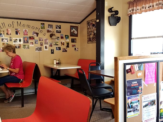 The "Wall of Memories" tells stories without saying a word. Every photo represents someone who found their place at this table. 