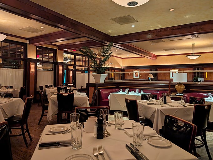 The dining room where business deals and marriage proposals share the same air. Notice how everyone looks slightly better in this lighting?