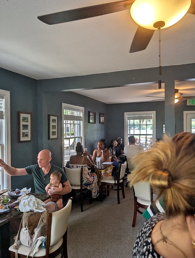 The dining room buzzes with conversation and clinking silverware, a soundtrack as essential to the experience as the food itself.