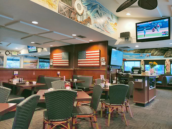 The dining area isn't just tables and chairs—it's a community gathering spot where American flags remind you that breakfast patriotism is real.