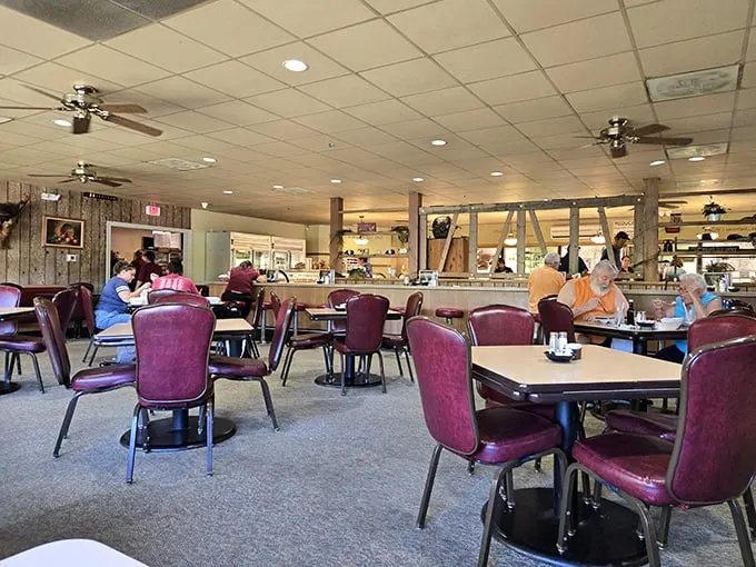 Purple chairs and wood-paneled walls create the kind of dining room where strangers become neighbors and calories don't count on Sundays.
