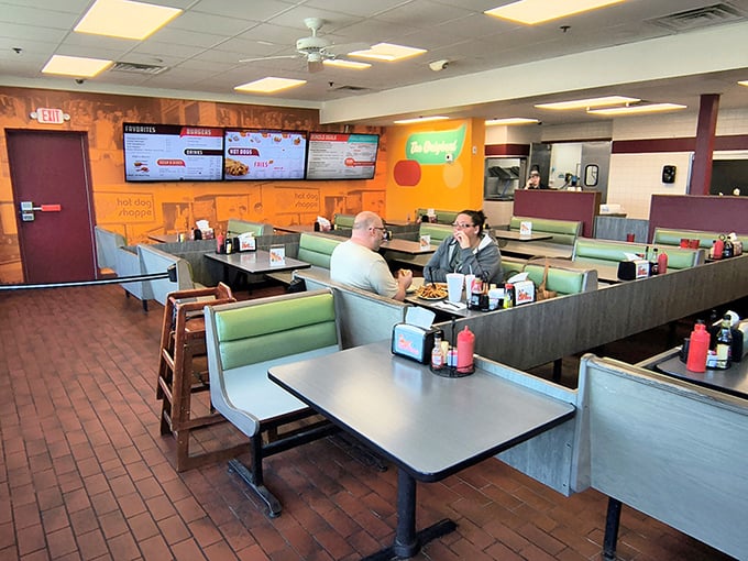 The dining area balances comfort with efficiency—the backdrop for countless family meals and first dates. These booths have heard some stories!