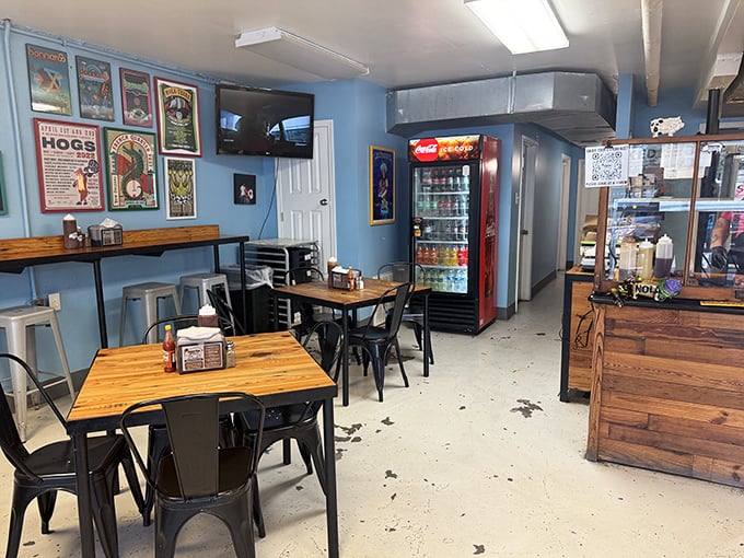 Simple tables, metal chairs, and blue walls create the perfect stage where the real stars – those smoked meats – can shine.