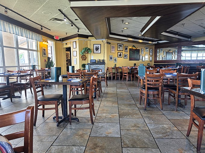 The dining room's thoughtful layout means you're never far from a window view—because pasta tastes better with a side of Pacific blue.