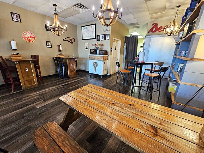Rustic wooden tables, barrel chandeliers, and the promise of barbecue—this dining area speaks the universal language of comfort.