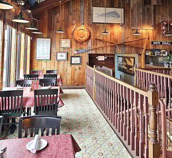 Wooden walls that could tell seafaring tales, if walls could talk. The nautical decor isn't kitsch—it's maritime history with dinner service.