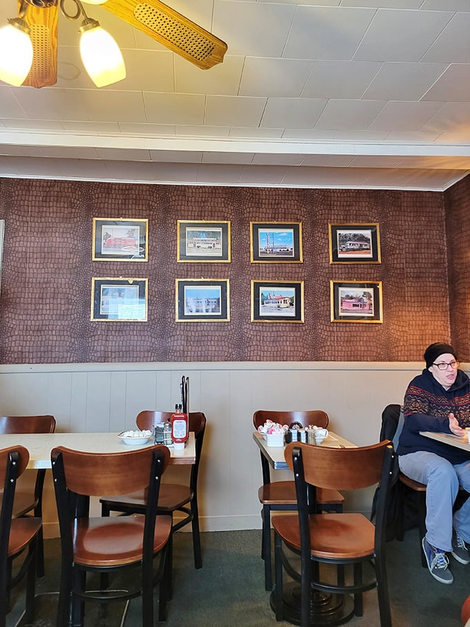 Framed pictures line textured walls while wooden chairs invite you to stay awhile – Fred's dining area feels like your favorite aunt's kitchen, if she could cook for 50.
