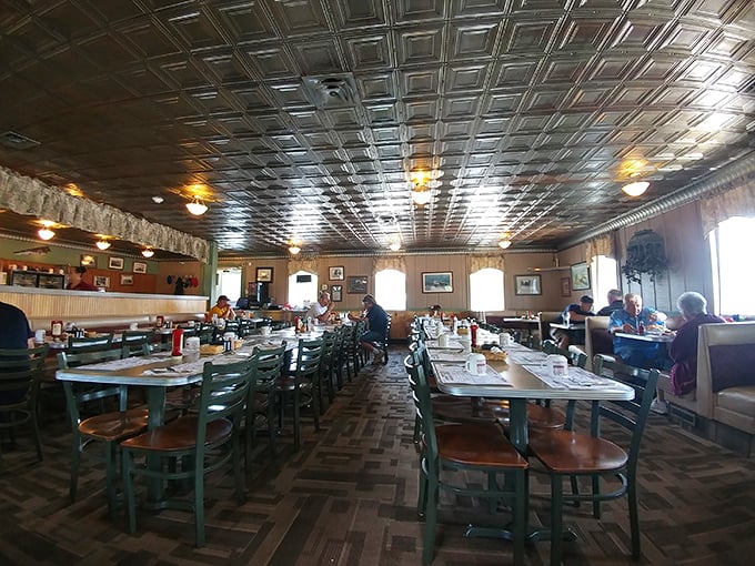 The dining room where memories are made, under pressed tin ceilings that have witnessed decades of first dates and family gatherings.