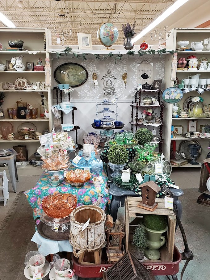 A feast for collectors' eyes! Every shelf tells a different story, from Depression glass to vintage figurines.