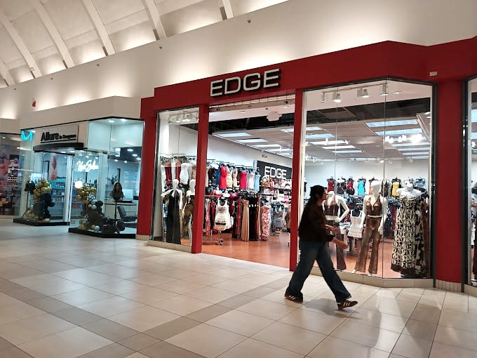 Edge's bold red storefront cuts through the retail noise, offering a splash of color and contemporary fashion that catches the eye of mall wanderers.