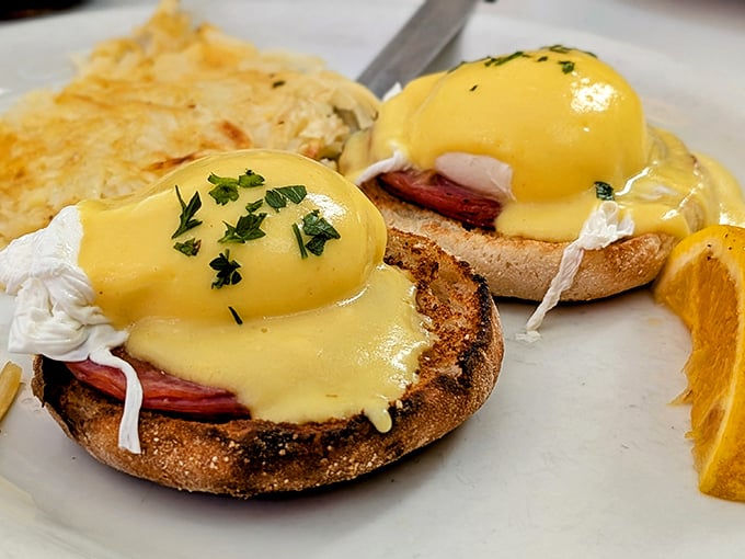 Eggs Benedict that would make the pope jealous—hollandaise sauce cascading down like a yellow waterfall of breakfast bliss.