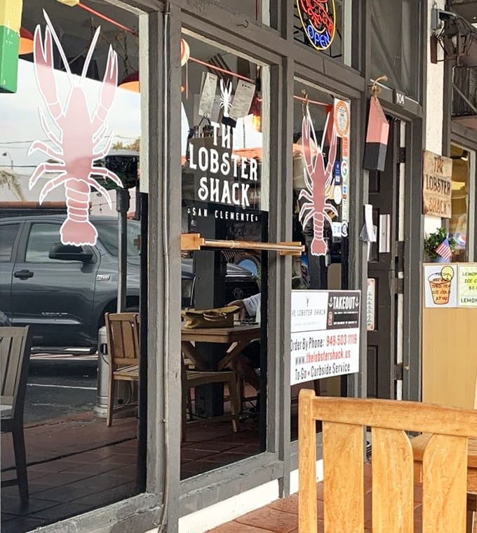A peek through the window reveals the San Clemente location. Different spot, same seafood magic – like finding a second Christmas in July.