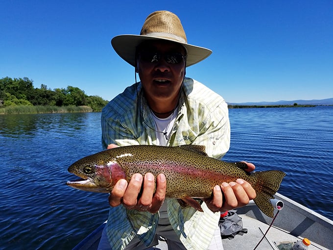 "Just another day at the office" – trophy rainbow trout are the reward for anglers willing to venture where the masses don't.
