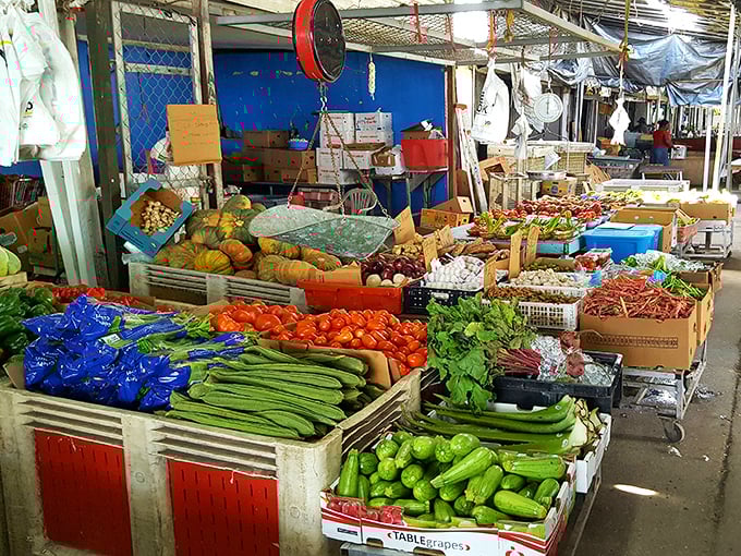 Fresh produce creates a rainbow of nutrition amid the consumer goods. These vegetables didn't get the memo about this being a flea market, not a farmer's market.
