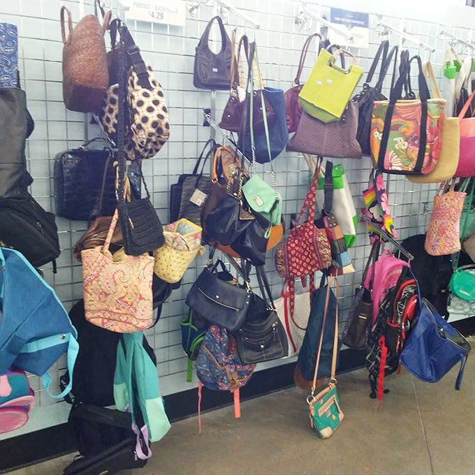 Handbags hang like a rainbow of possibilities – from practical totes to "what were they thinking?" gems.