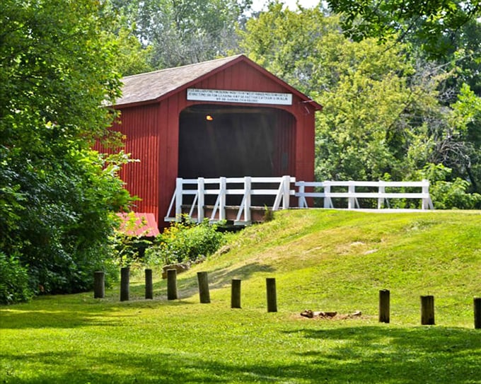 This covered bridge doesn't just span a creek – it connects us to an era when craftsmanship mattered and "rush hour" involved actual horses.