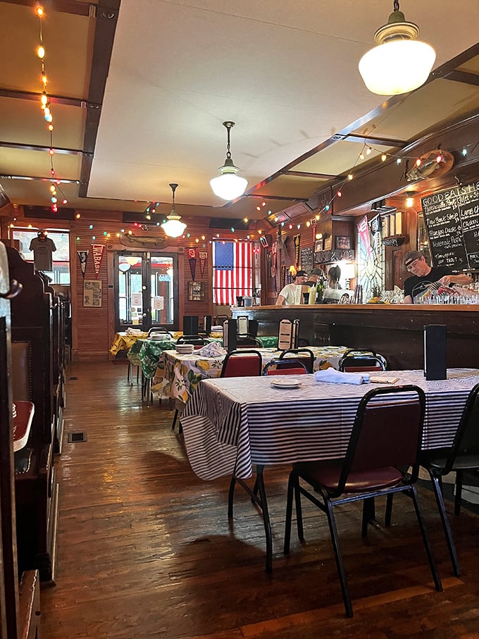 The worn wooden floors have supported generations of happy diners, while American flags and pennants tell stories of local pride and history.