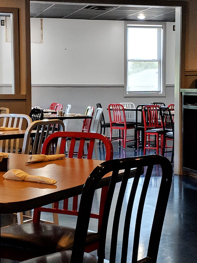 The dining room's colorful chairs add just enough personality without distracting from the real reason everyone's here: that legendary prime rib.