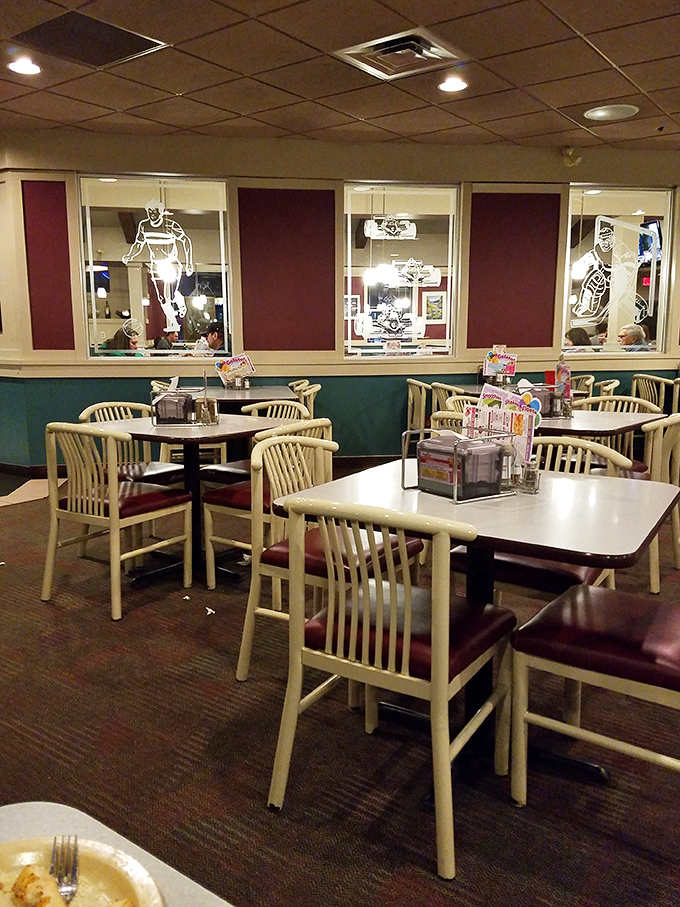 The dining area's thoughtful design creates intimate spaces within the larger restaurant. Those dividers aren't just decor—they're conversation incubators.