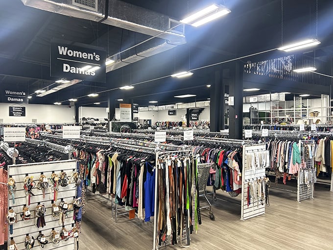 The expansive women's department features bilingual signage, making treasure hunting accessible to Tampa's diverse community. Fashion speaks all languages.