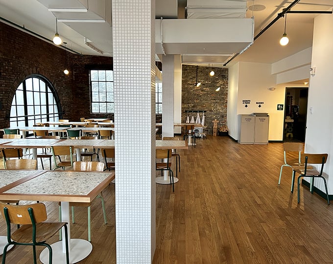 Exposed brick, wooden floors, and tables that have witnessed countless first bites and "you've got to try this" moments.