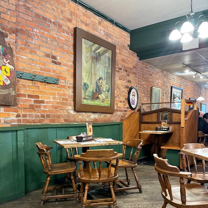 The dining room feels like someone's lovingly preserved family home, where exposed brick meets wooden chairs that have supported generations of satisfied diners.