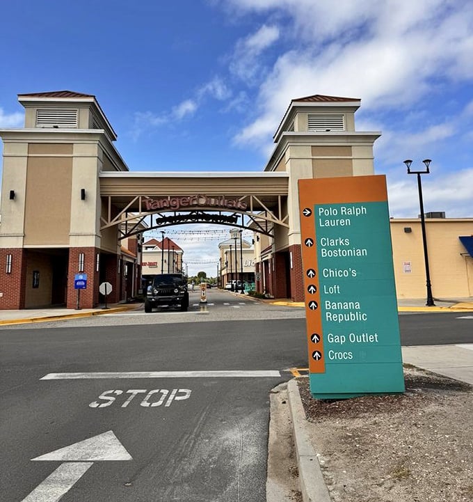 The entrance sign that promises brand names without the brand-name prices—like a roadmap to retail nirvana.