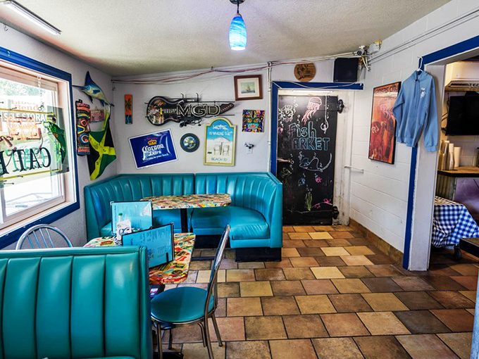 Another angle reveals the diner's playful personality – beer signs, fishing décor, and that unmistakable "you're among friends" vibe that makes regulars out of first-timers.