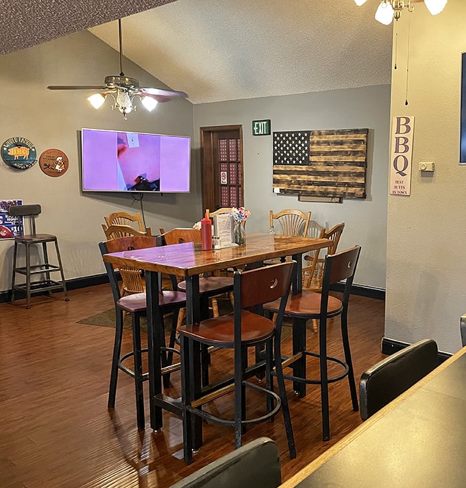 High-top tables, wooden chairs, and a TV for game day – the dining room says "stay awhile" without having to say a word.