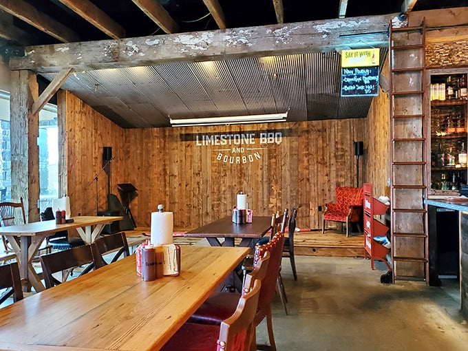 The performance stage area isn't just for show—it's where live music meets live fire cooking in Delaware's most delicious duet.