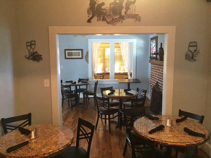 Dining rooms that feel like someone's beloved home – where tables invite lingering conversations and second helpings of dessert.