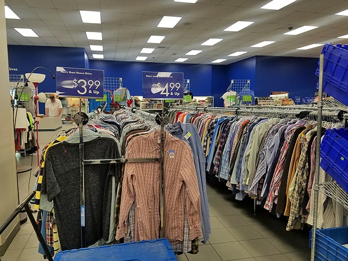 Men's shirts stretch as far as the eye can see, organized by size and type for easy browsing – no treasure map required.