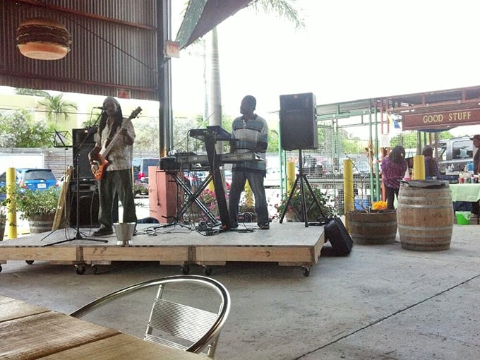 Live music transforms shopping into an impromptu festival, where picking produce happens with a soundtrack worthy of your food journey.