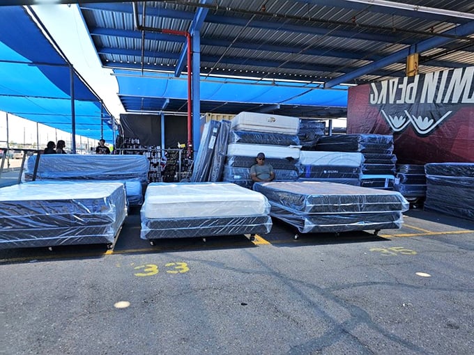 Mattress mountain! The ultimate adult playground where you can find your perfect firmness without a salesperson hovering nearby.