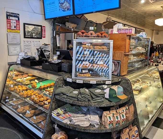 The bakery counter—where willpower goes to die and happiness begins. Those pastries aren't just baked goods—they're edible works of art waiting for their forever home.