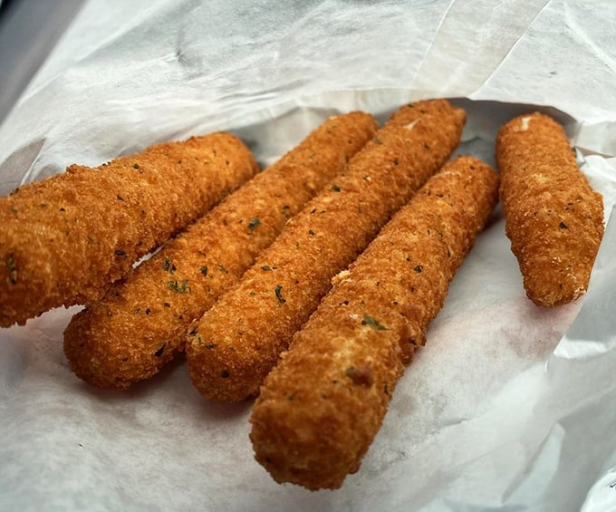 Golden-brown mozzarella sticks – because sometimes you need a crispy, cheese-pulling appetizer before tackling sandwich mountain.