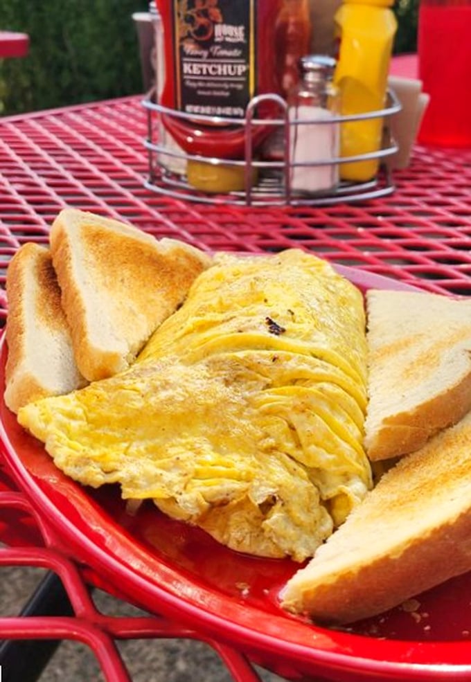 An omelet so perfectly golden, it makes the sunrise jealous – and that's before you taste it.