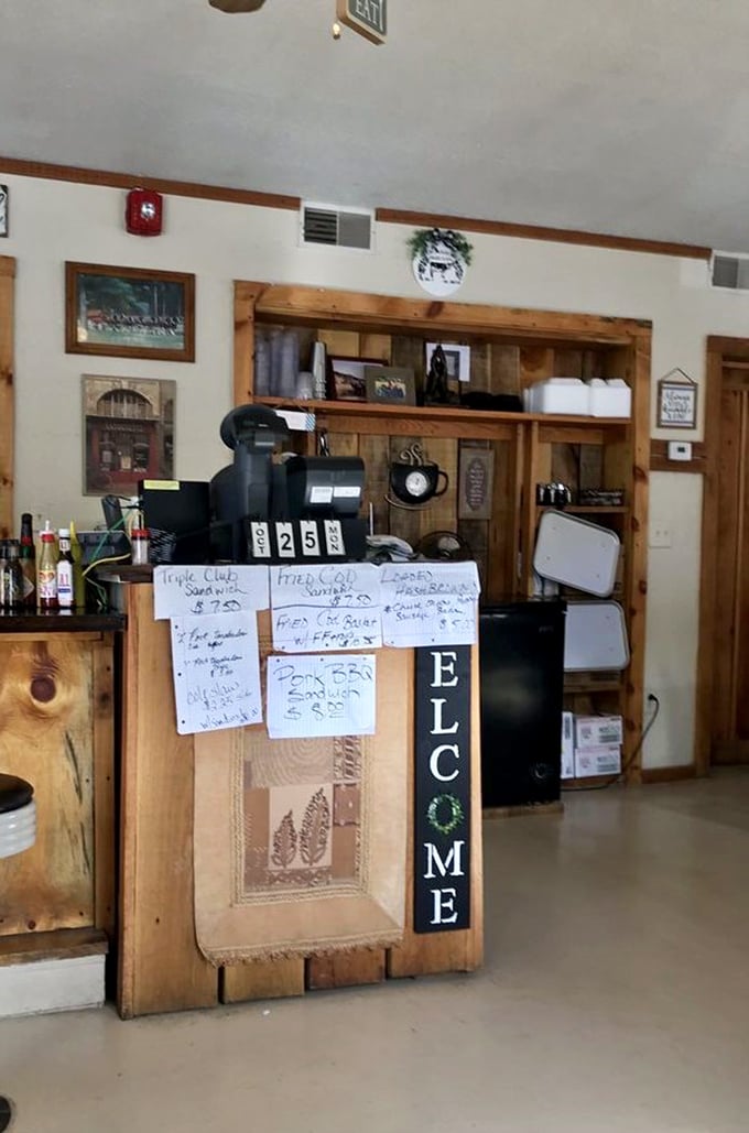 The order counter—where dreams are placed and fulfilled. Those handwritten specials aren't just menu items; they're love letters to your appetite.