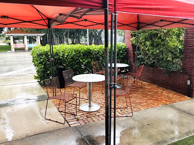 Even rain can't dampen the appeal of Howley's outdoor seating area, where red umbrellas add a pop of color to the brick-lined space.