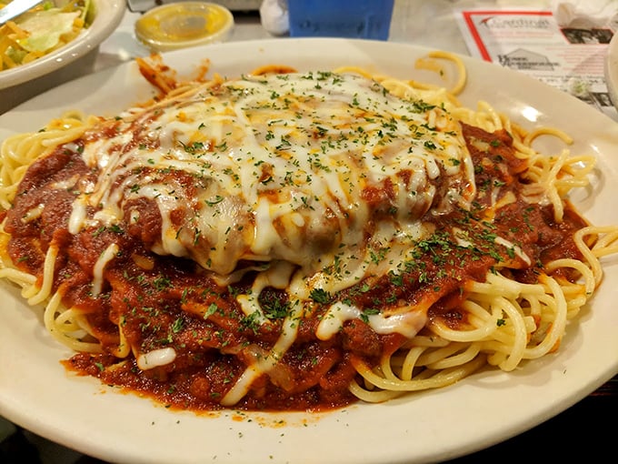 Spaghetti and meat sauce under a blanket of melted cheese. Italian-American comfort that would make even your grandmother nod in approval.