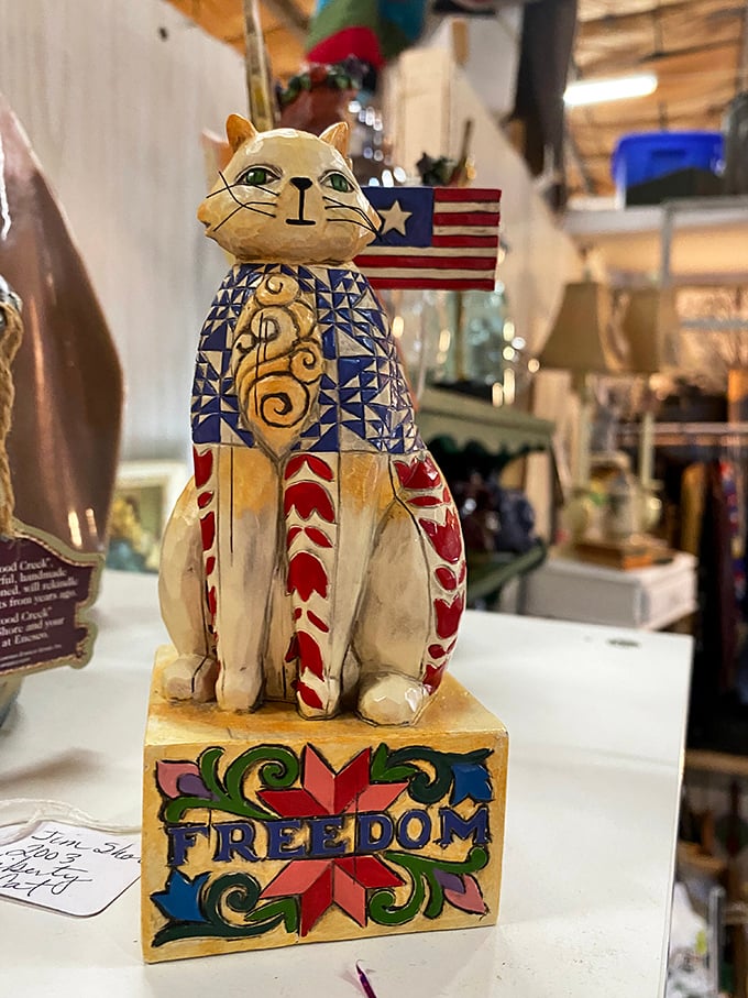 Freedom feline! This patriotic porcelain cat figurine combines Americana with the internet's favorite animal in one gloriously kitschy collectible.
