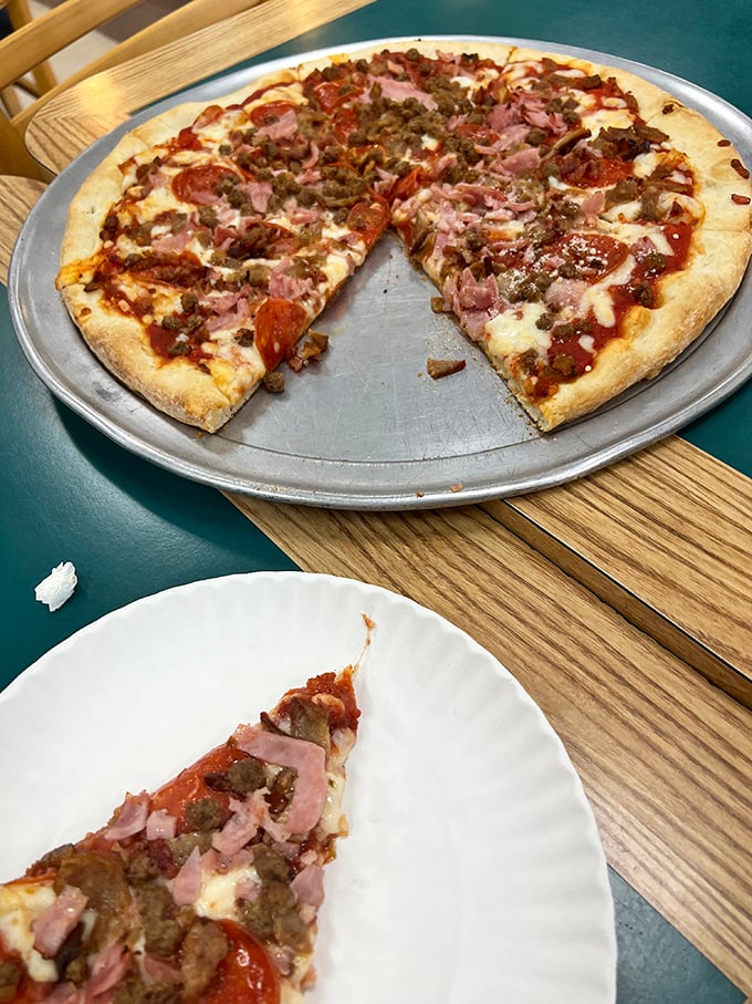 The meat lover's dream realized: a pizza that doesn't skimp on the good stuff. That perfect circle of ham, pepperoni, and sausage is practically a protein supplement.