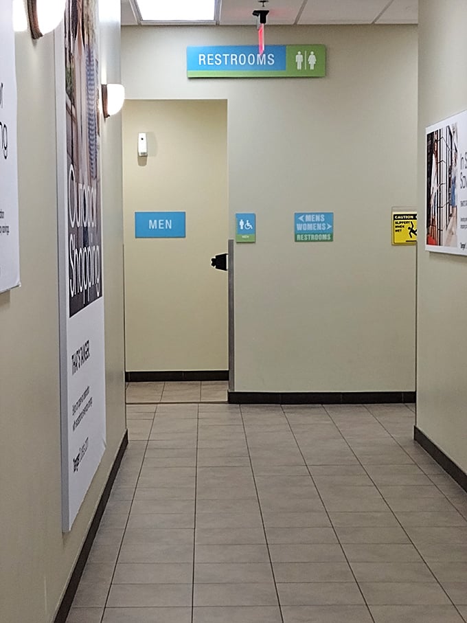 Even the restroom signage maintains the outlet's clean, organized aesthetic—because shopping marathons require proper pit stops.