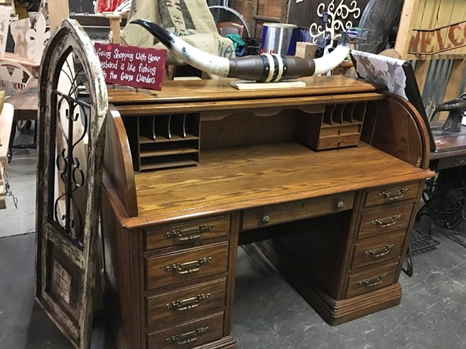 This roll-top desk has seen more secrets than a small-town banker—just imagine the letters written and bills paid at this magnificent wooden command center.